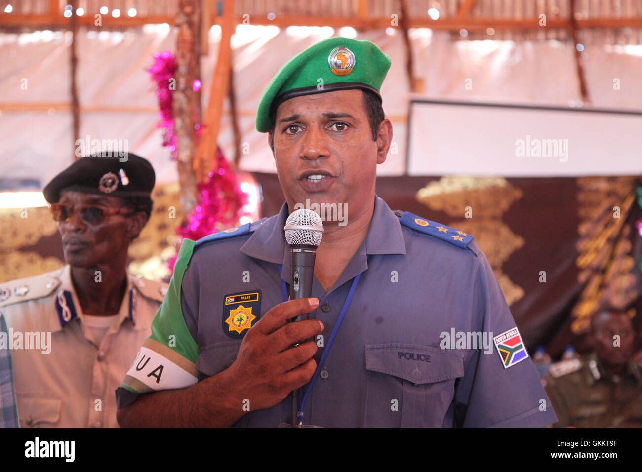 AMISOM Police Commissioner Anand Pillay addresses the ceremony marking ...