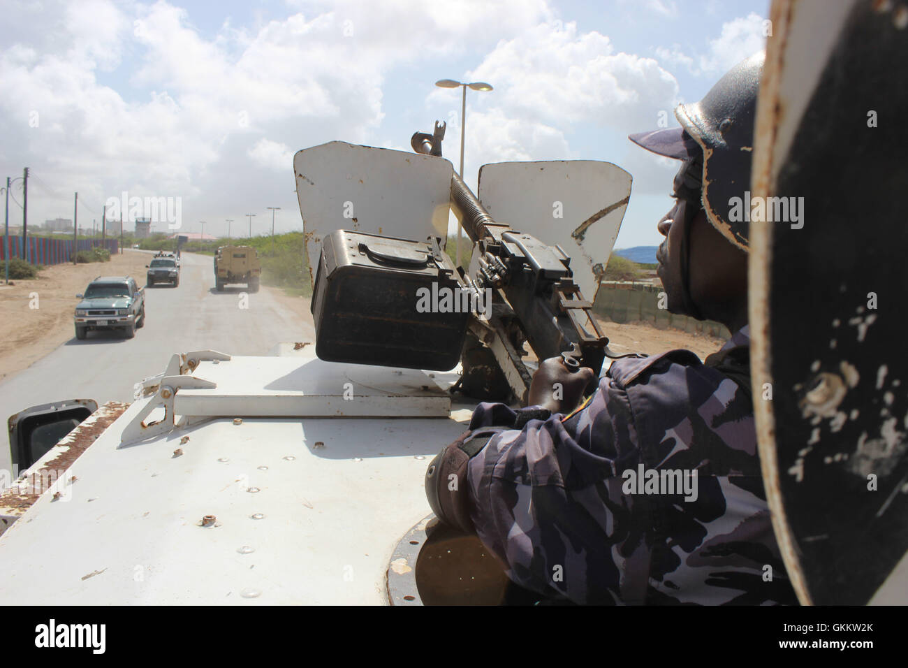 On June 6, 2016, an AMISOM police officer rides in an armoured vehicle ...