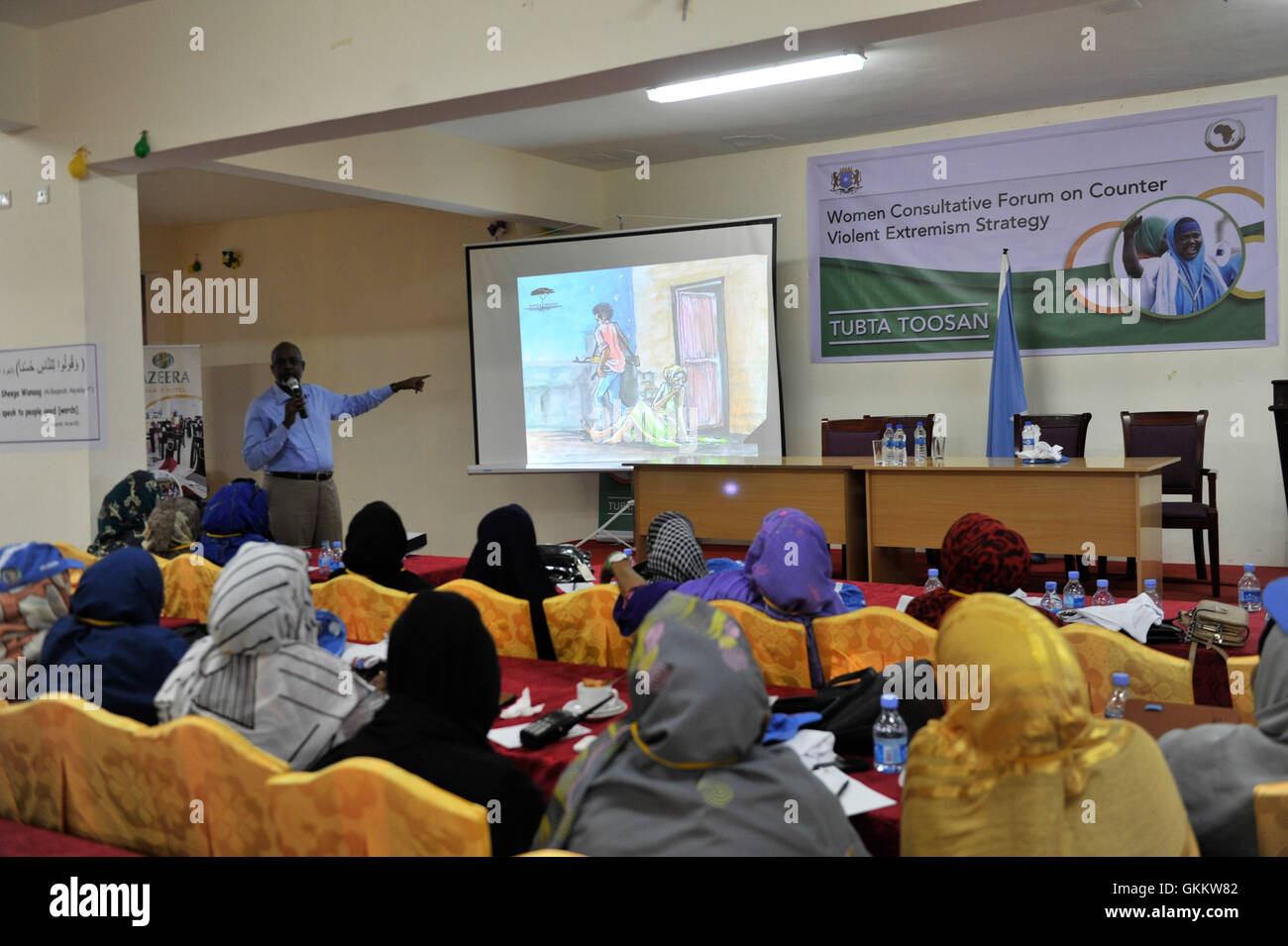 Osman Moallim, Executive Director of SOYDEN, presents at the Women’s ...