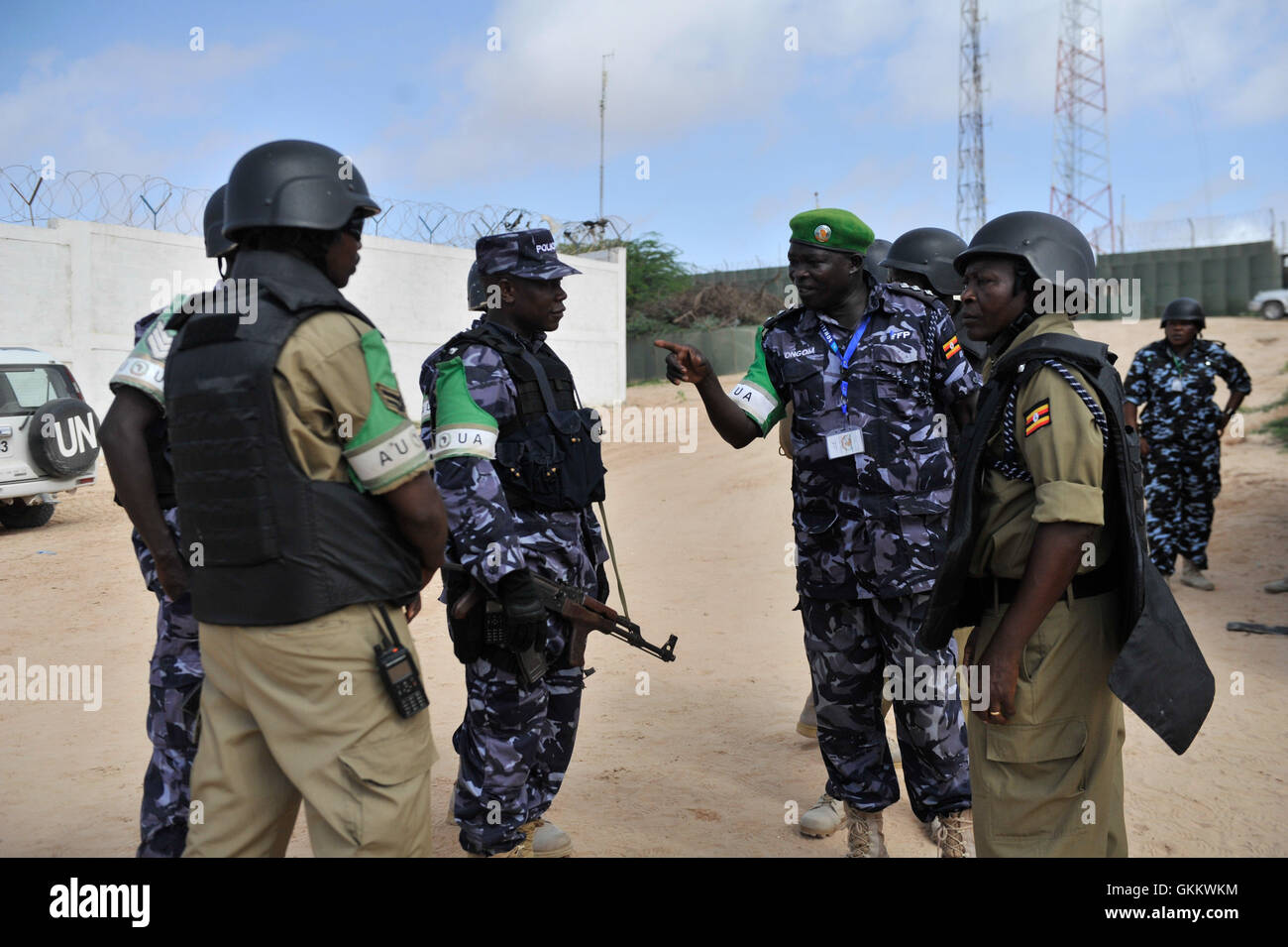 AMISOM police officers receive a briefing from their commanders on June ...