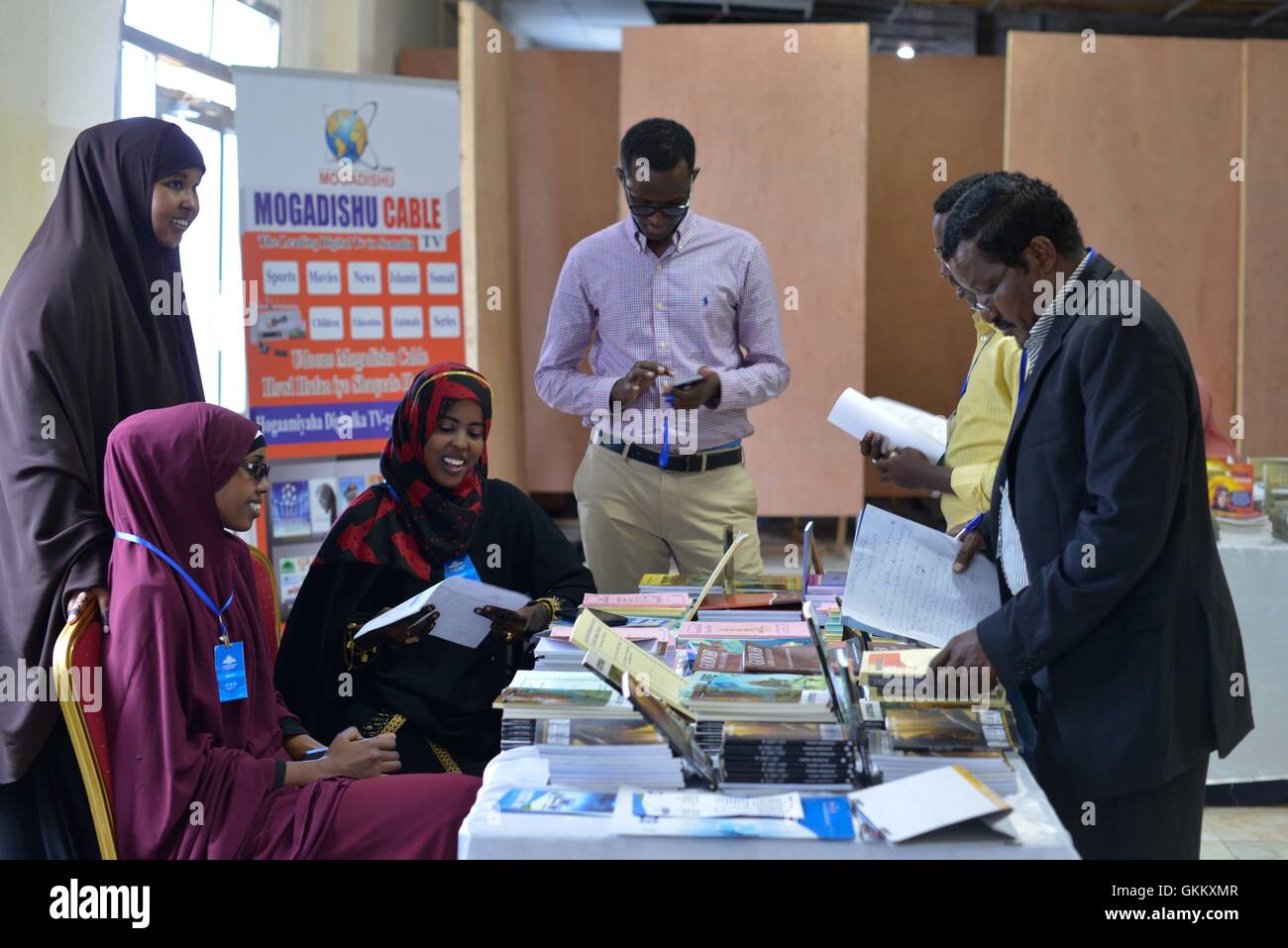 Reading enthusiasts browse book stalls at the Mogadishu International ...