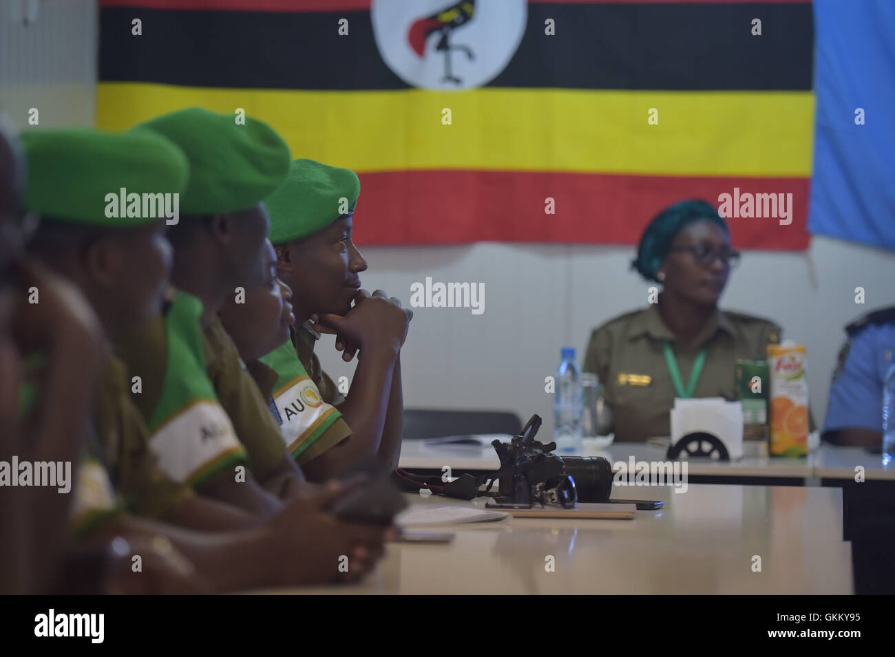 Police officers of the African Union Mission in Somalia (AMISOM) attend ...