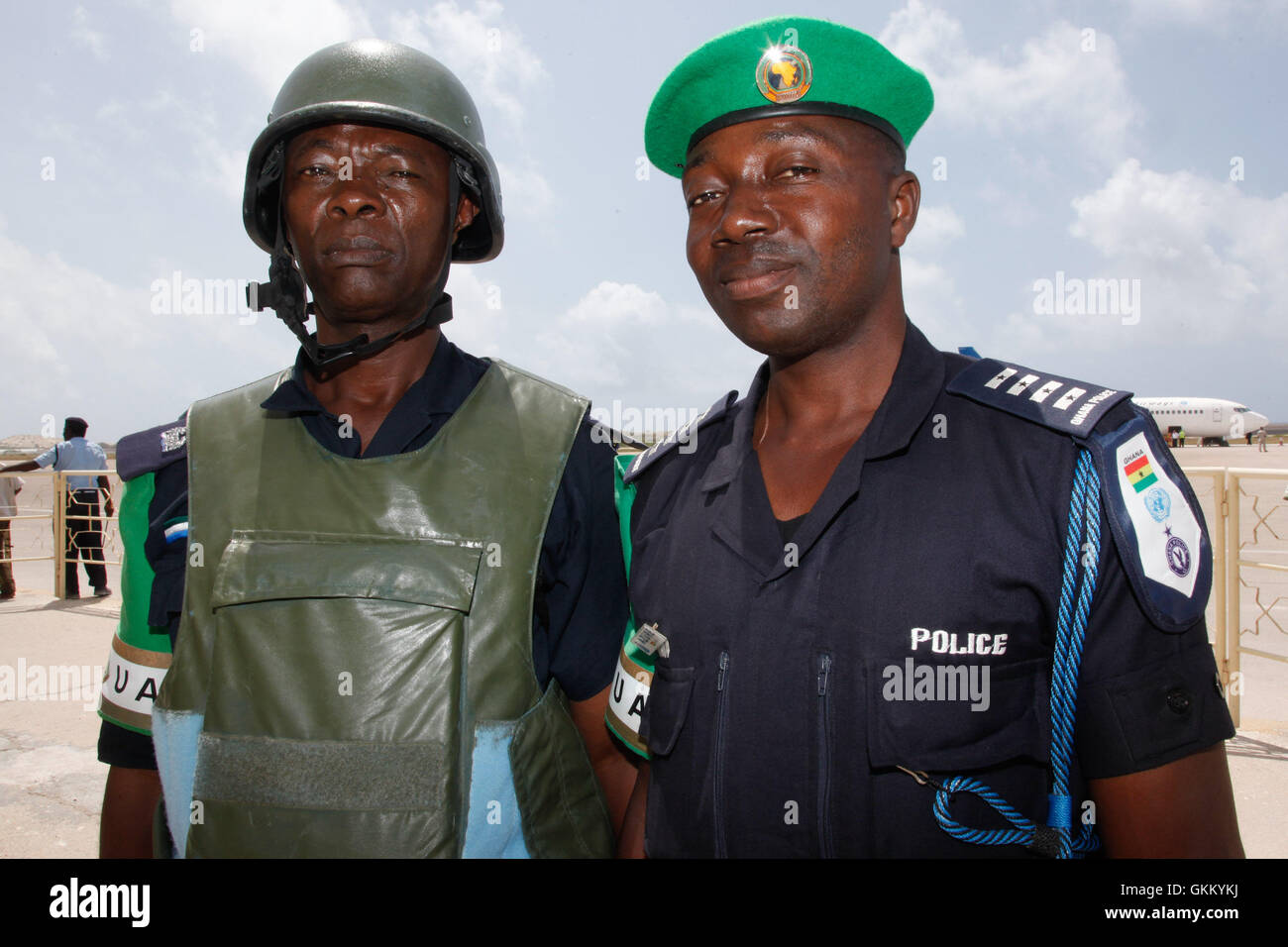 African Union Police officers on duty at Mogadishu Airport assist with ...