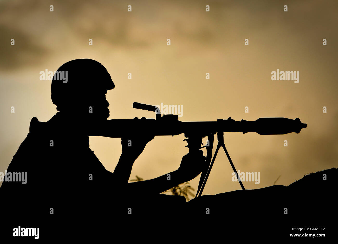 On April 30, 2013, a Ugandan soldier from AMISOM's 341 Battalion held a ...