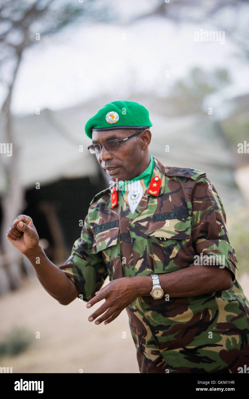 Brigadier Anthony Ngere, AMISOM Commander of Sector Two, speaks with ...