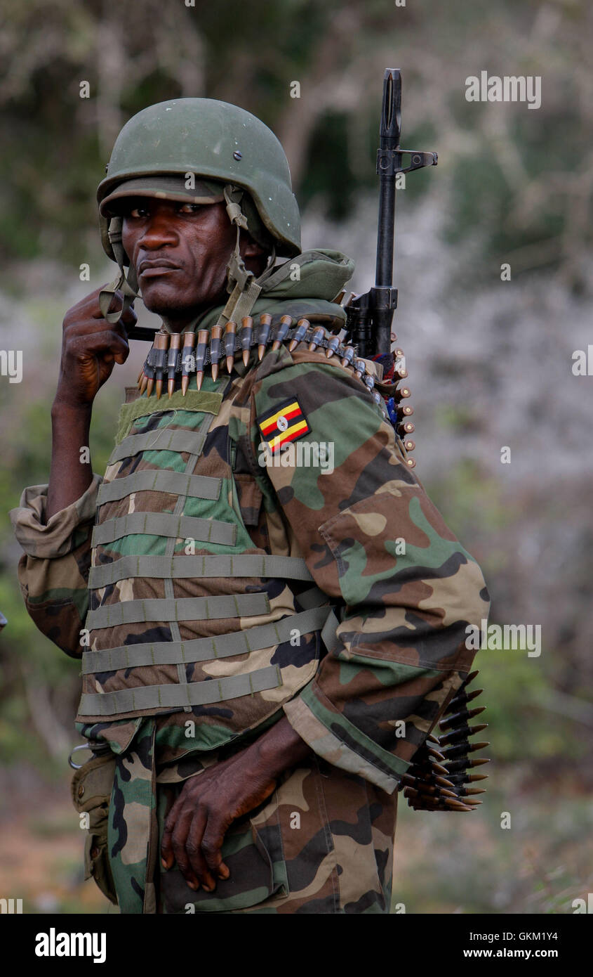 On November 28, a Ugandan soldier with AMISOM listens during a briefing ...