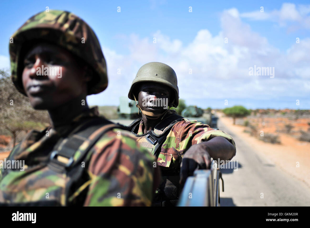 Soldiers patrol the road between Kismayo International Airport and the ...