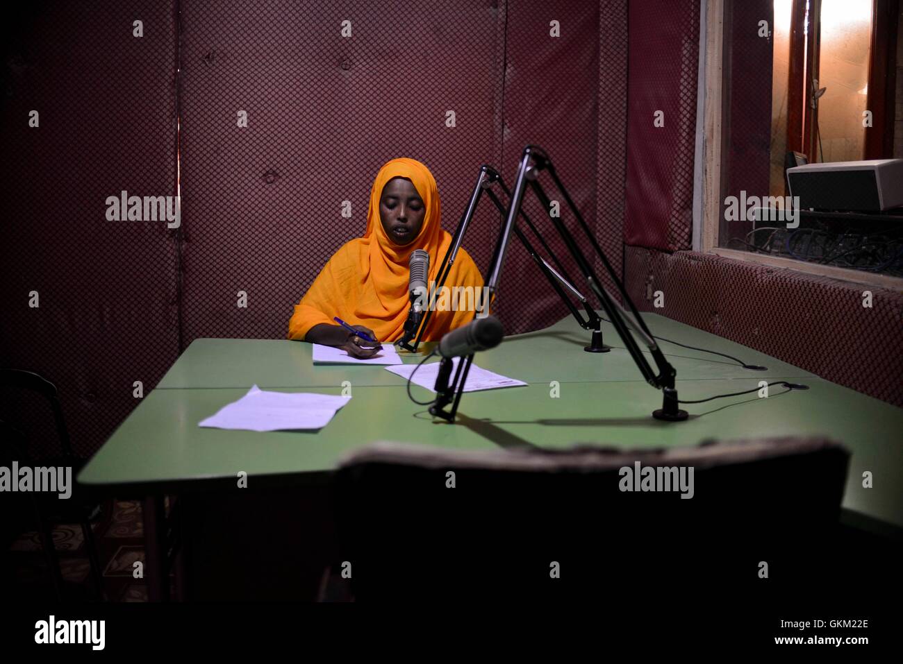 A presenter at Radio Shabelle reads the news, a key source of ...
