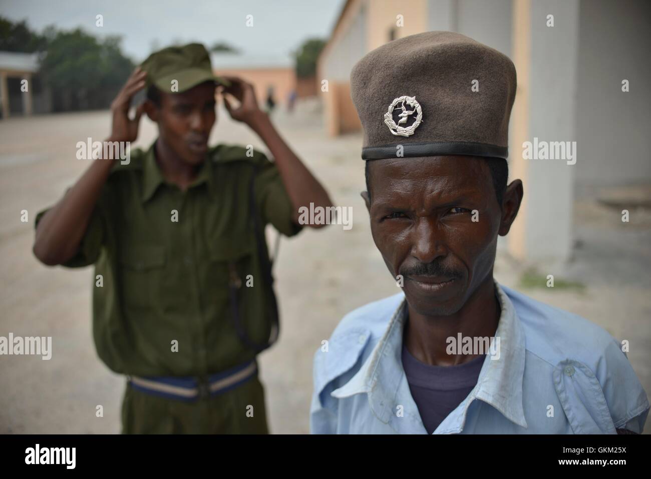 Somali police officers participate in a defensive driving course at a ...