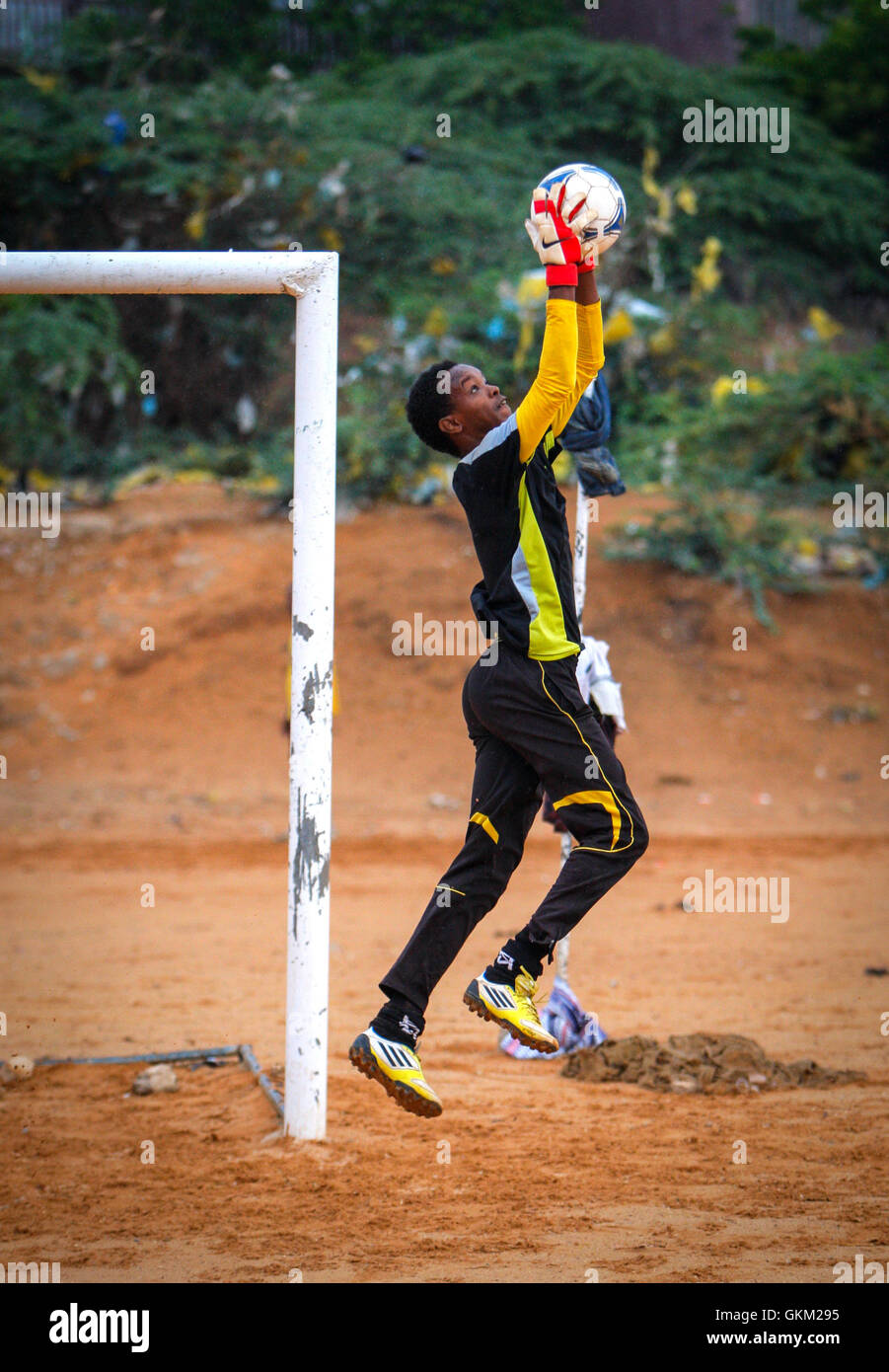 A goalkeeper from Elman FC trains in Mogadishu’s Hodan District on ...
