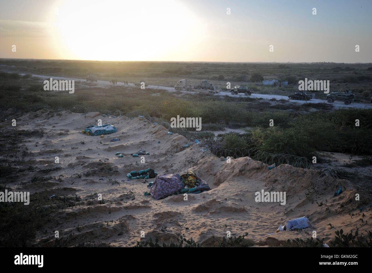 An African Union convoy stands ready outside an army base on February ...