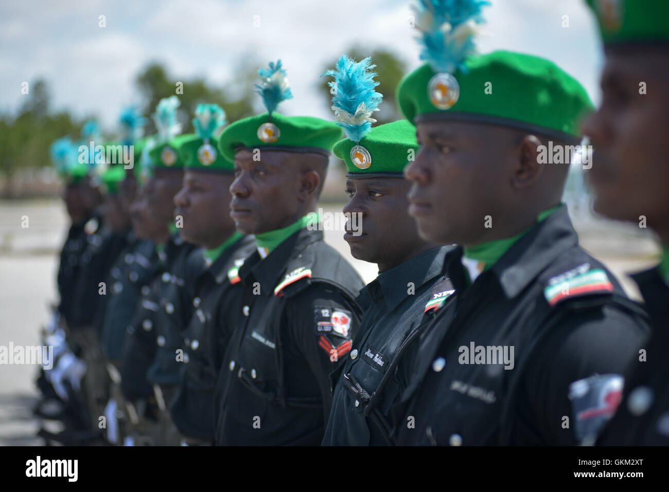 Nigerian AMISOM police officers stand at ease during a medal ceremony ...