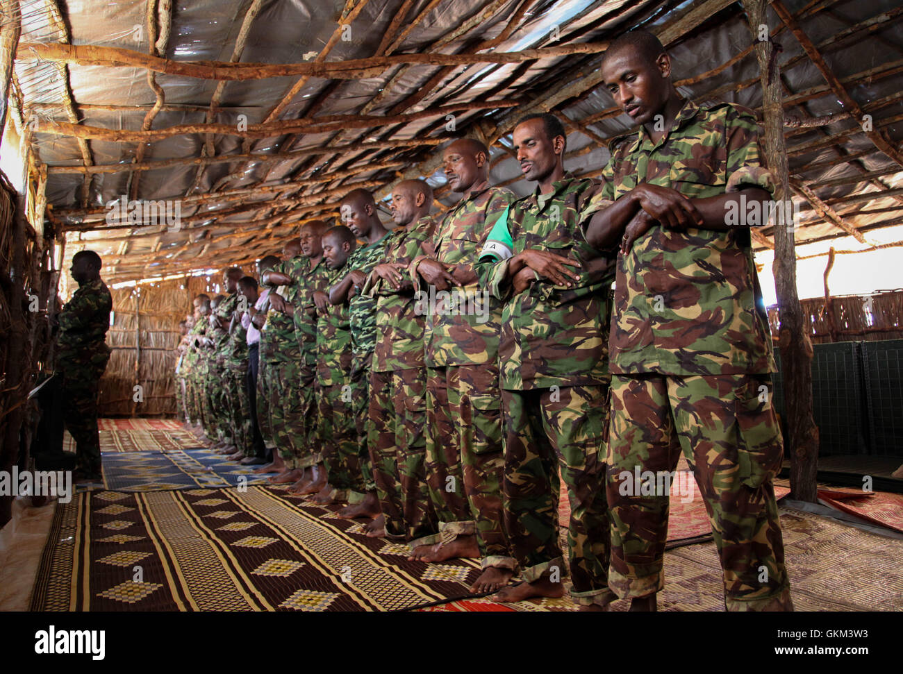 Muslim soldiers from the Kenyan Contingent serving with AMISOM pray during the holy month of ...