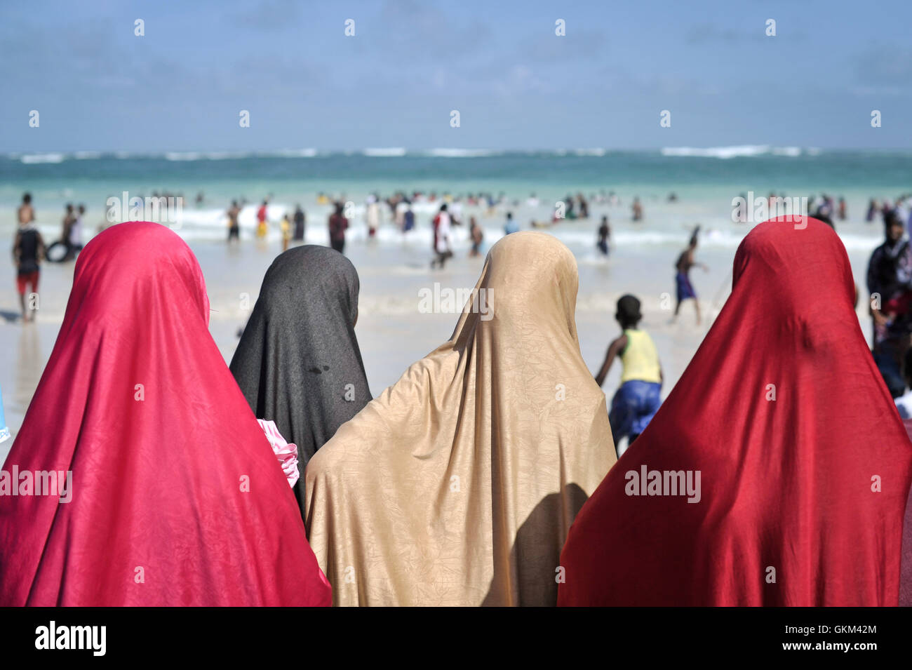 Muslim women on beach in hi-res stock photography and images - Alamy