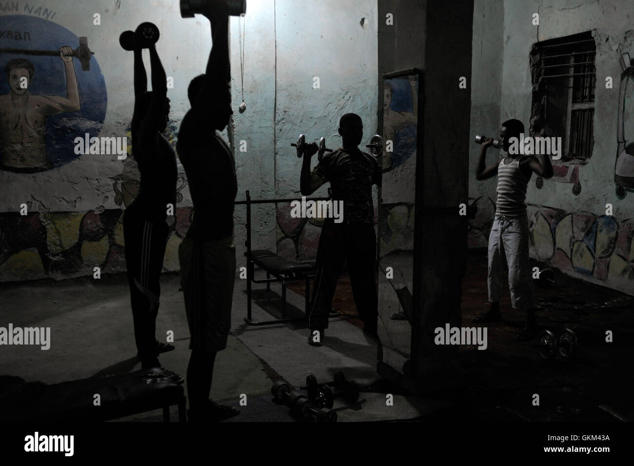 On August 12, weightlifters train together at a gym in the Hamar Weyne ...