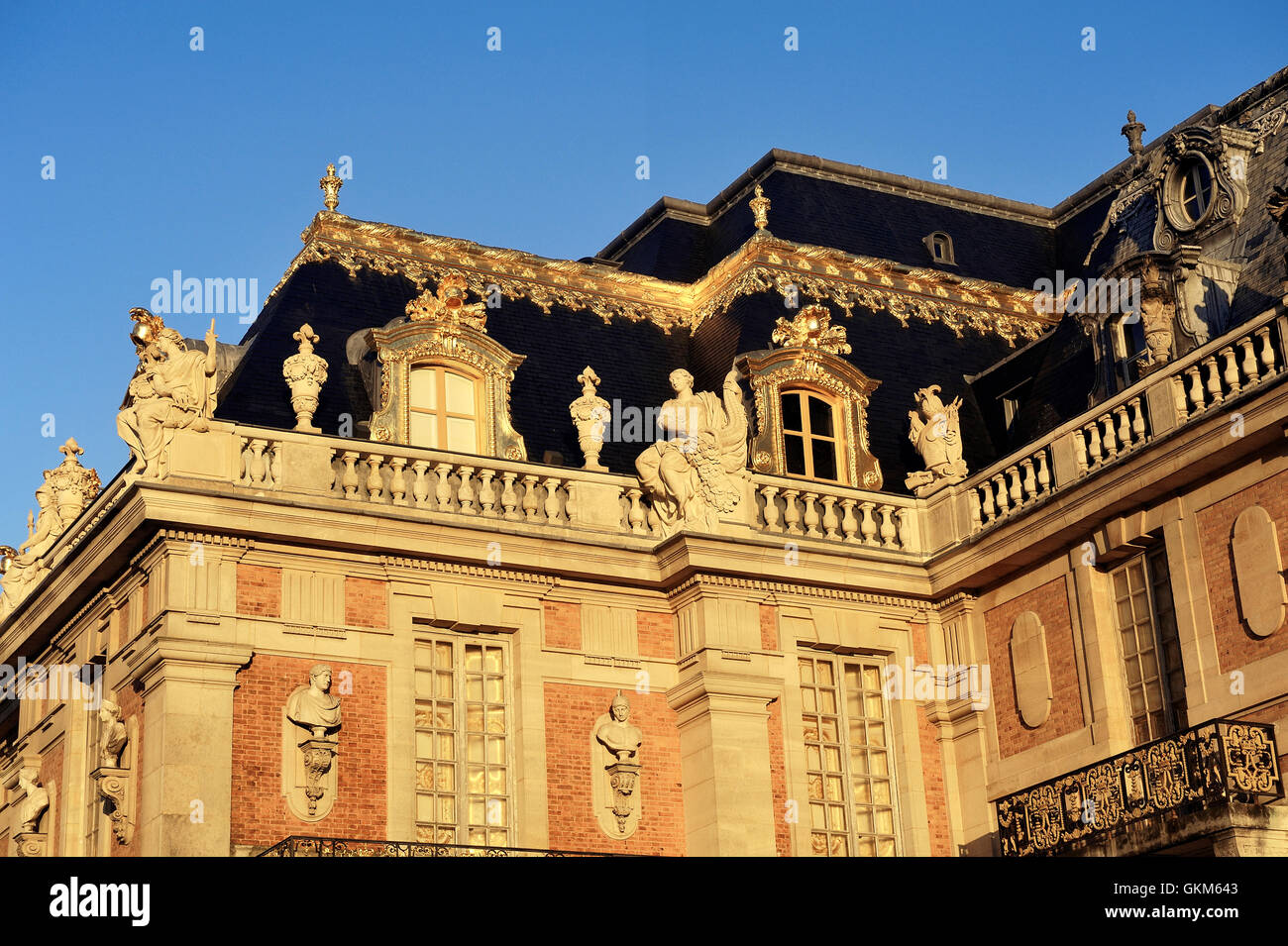 Castle of Versailles, architectural detail and gilding of the facade ...