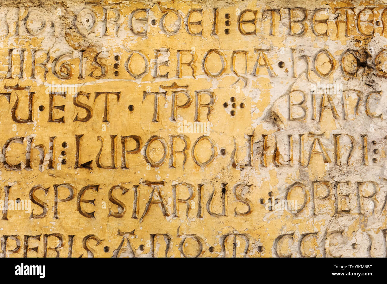 ancient latin script on a stone of the church S. Maria della Rosa in ...