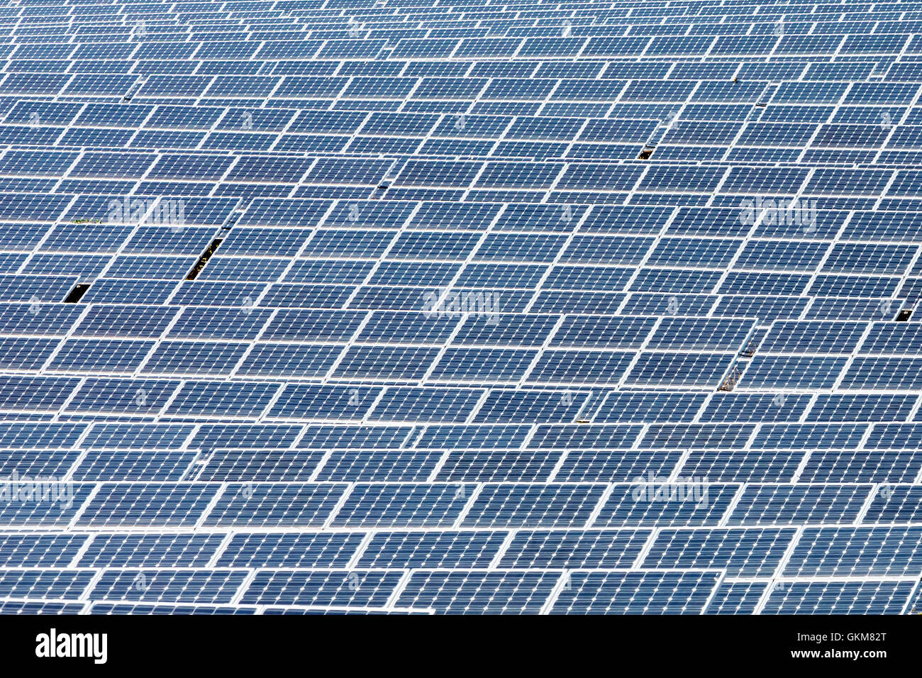 picture of a field with rows of solar collectors Stock Photo - Alamy