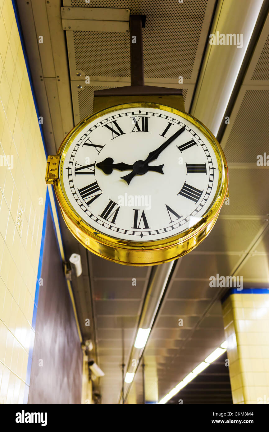 antique clock at a tube station in London, UK Stock Photo - Alamy