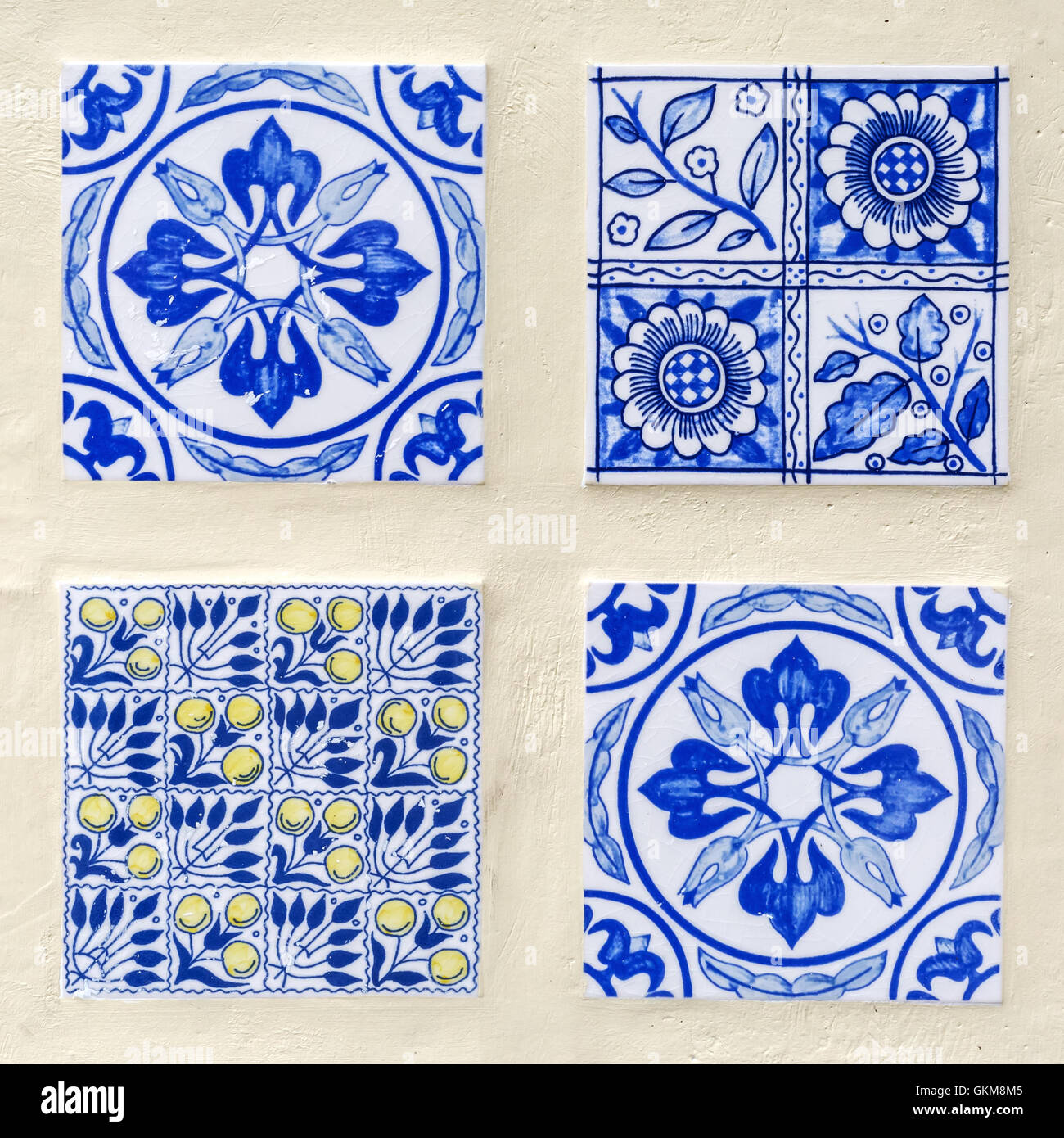 four different blue colored Moroccan style tiles Stock Photo - Alamy