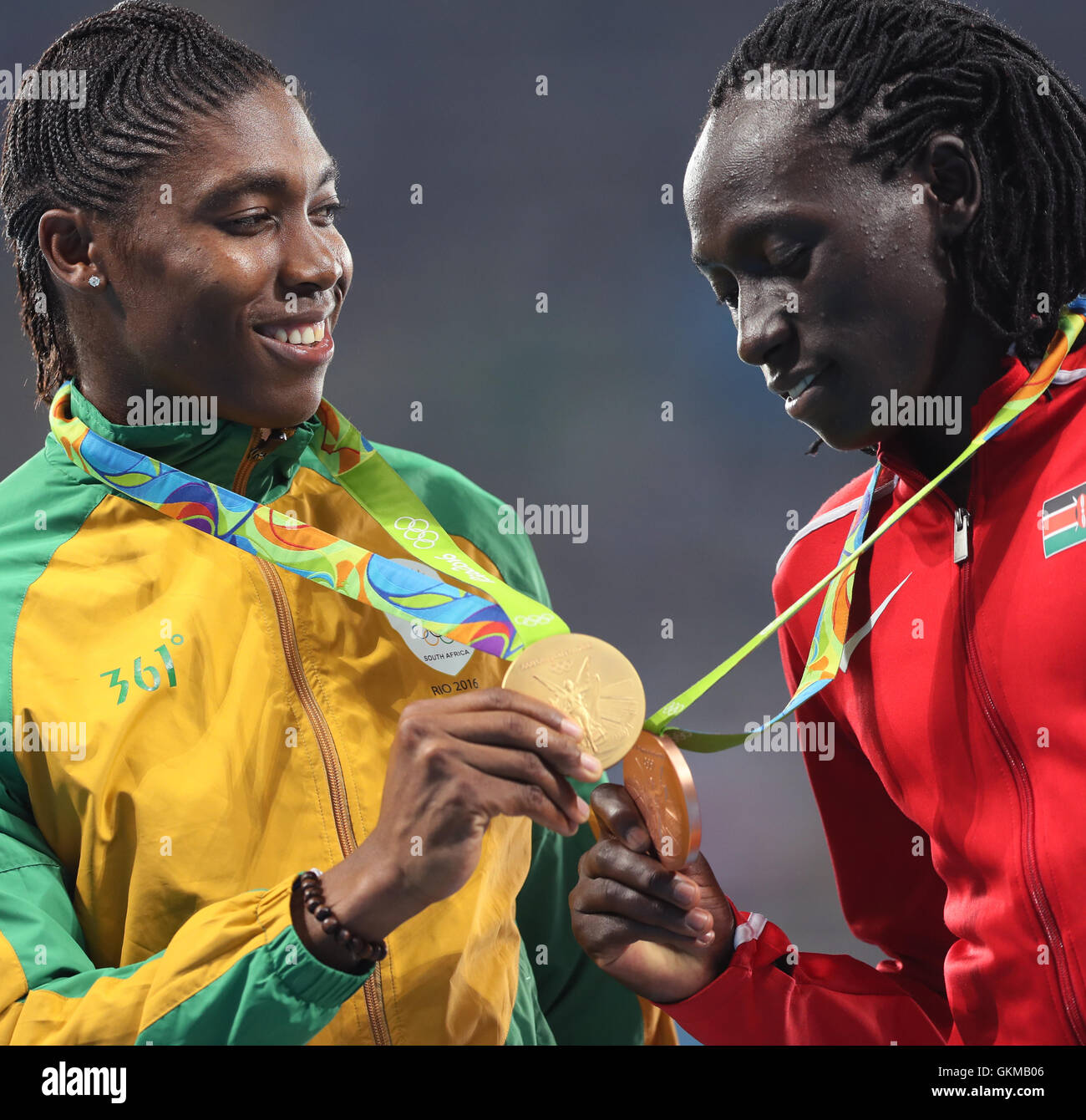South Africa's Caster Semenya (left) compares medals with Kenya's ...