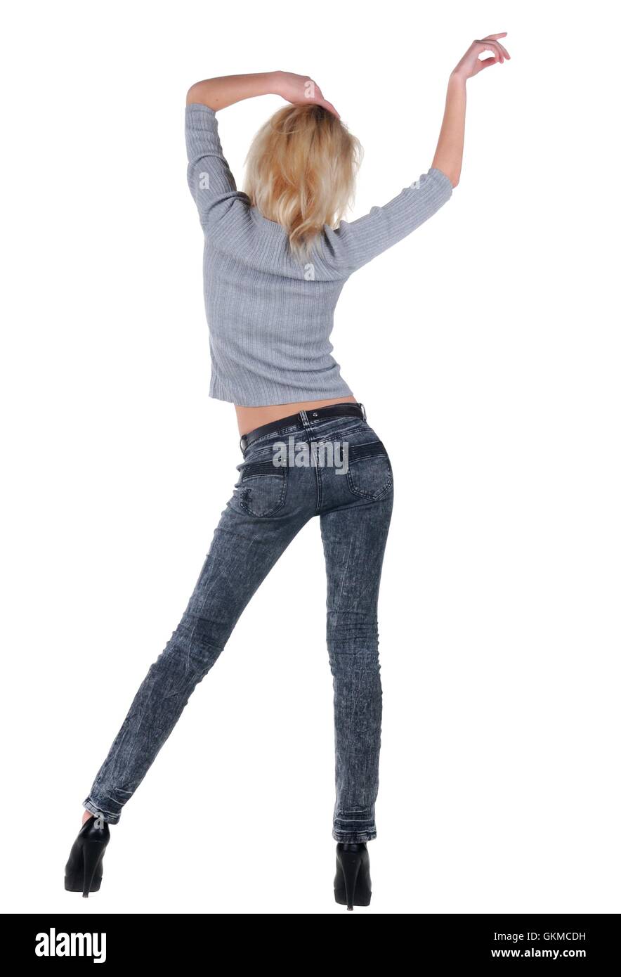 Young woman dancing. Rear view. Isolated over white Stock Photo - Alamy