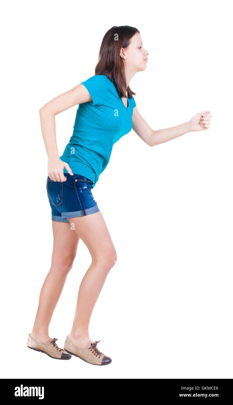 back view of running woman. beautiful brunette girl in motion Stock ...