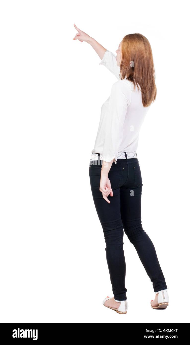Back view of pointing woman Stock Photo - Alamy