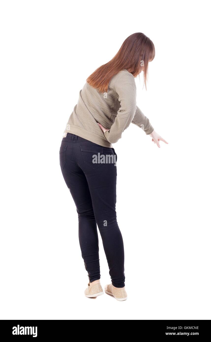 Back view of pointing woman Stock Photo - Alamy