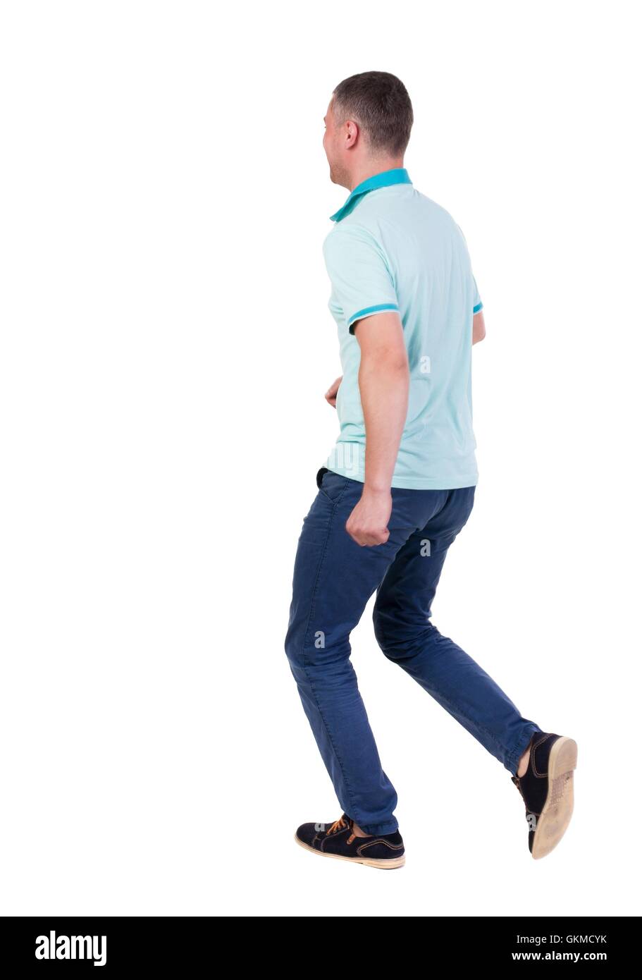 Back view of running man in blue polo Stock Photo - Alamy