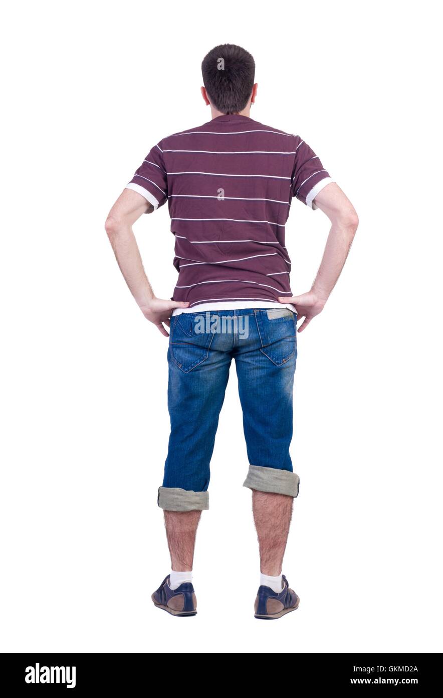 young man looks at white background. rear view Stock Photo - Alamy