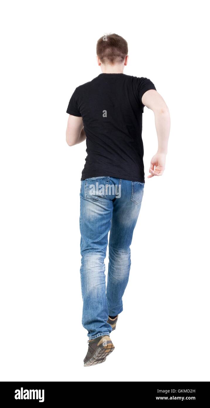 Back view of running man. Walking guy in motion Stock Photo - Alamy