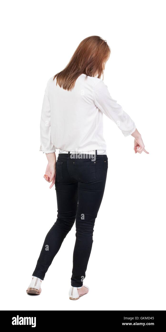 Back view of pointing woman Stock Photo - Alamy