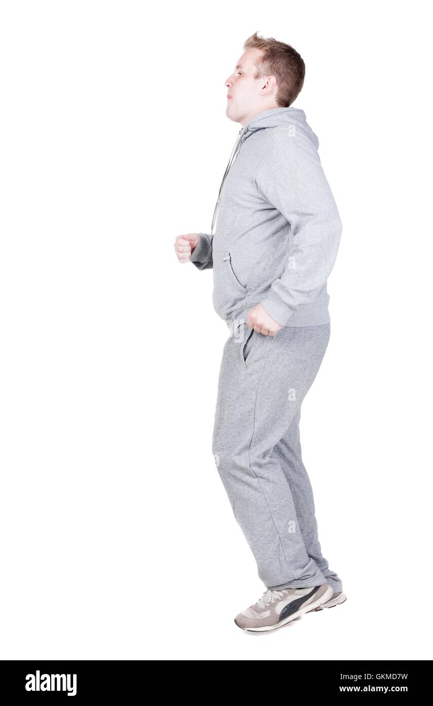 back view of running athlete man in tracksiut Stock Photo - Alamy