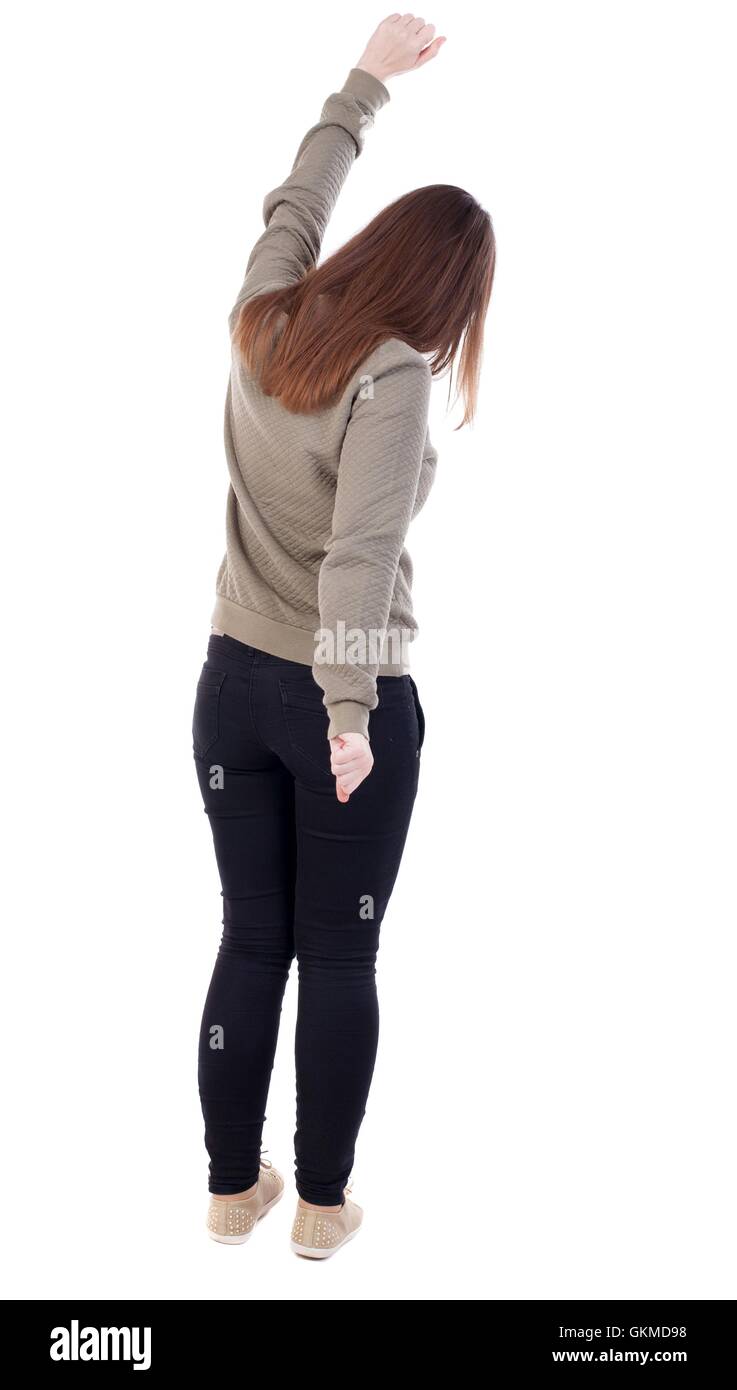 Back view of beautiful woman welcomes Stock Photo - Alamy