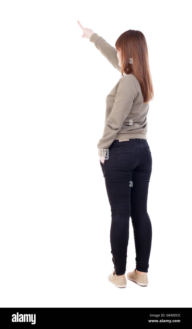 Back view of pointing woman Stock Photo - Alamy