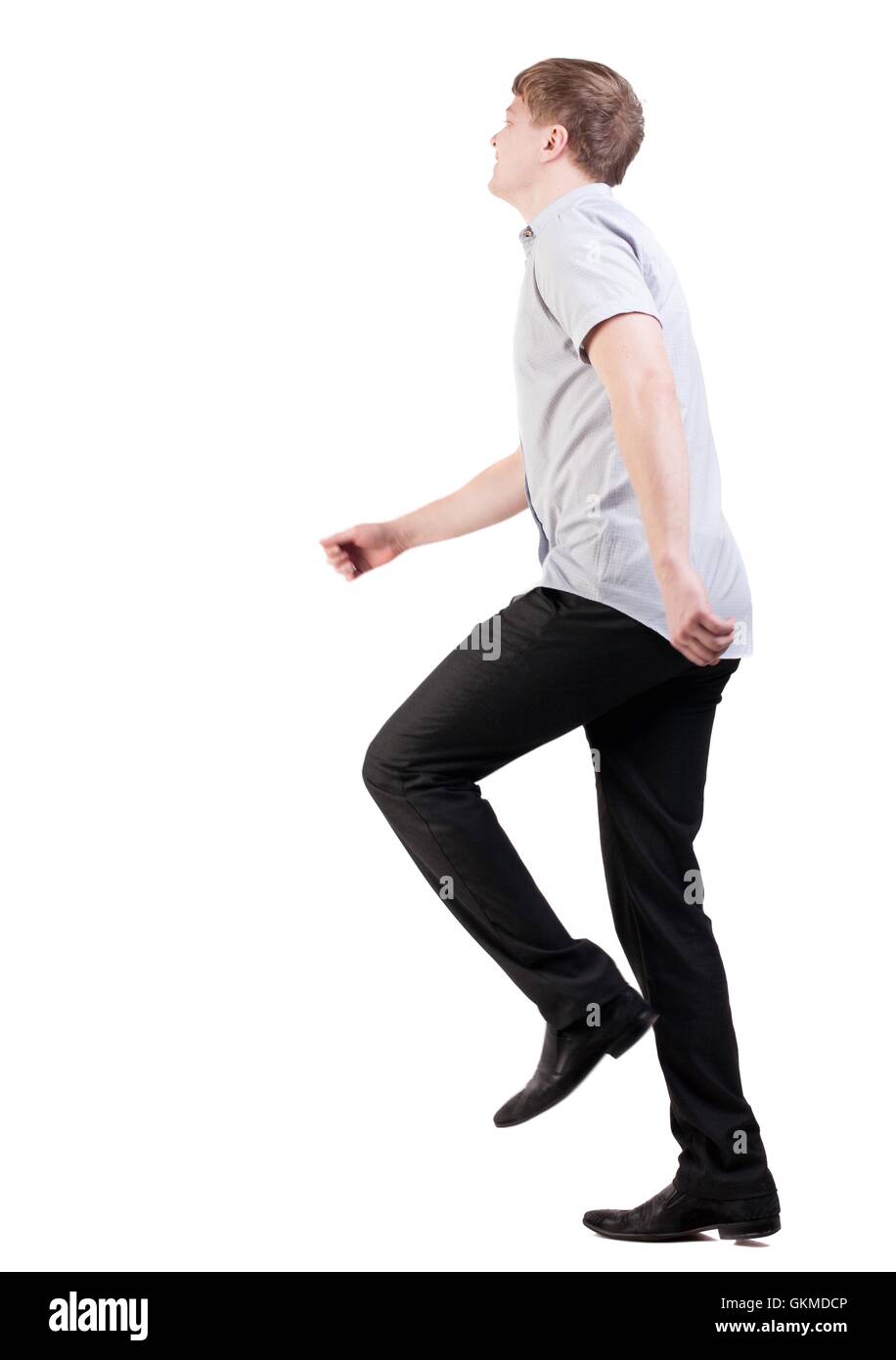 back view of running business man Stock Photo - Alamy