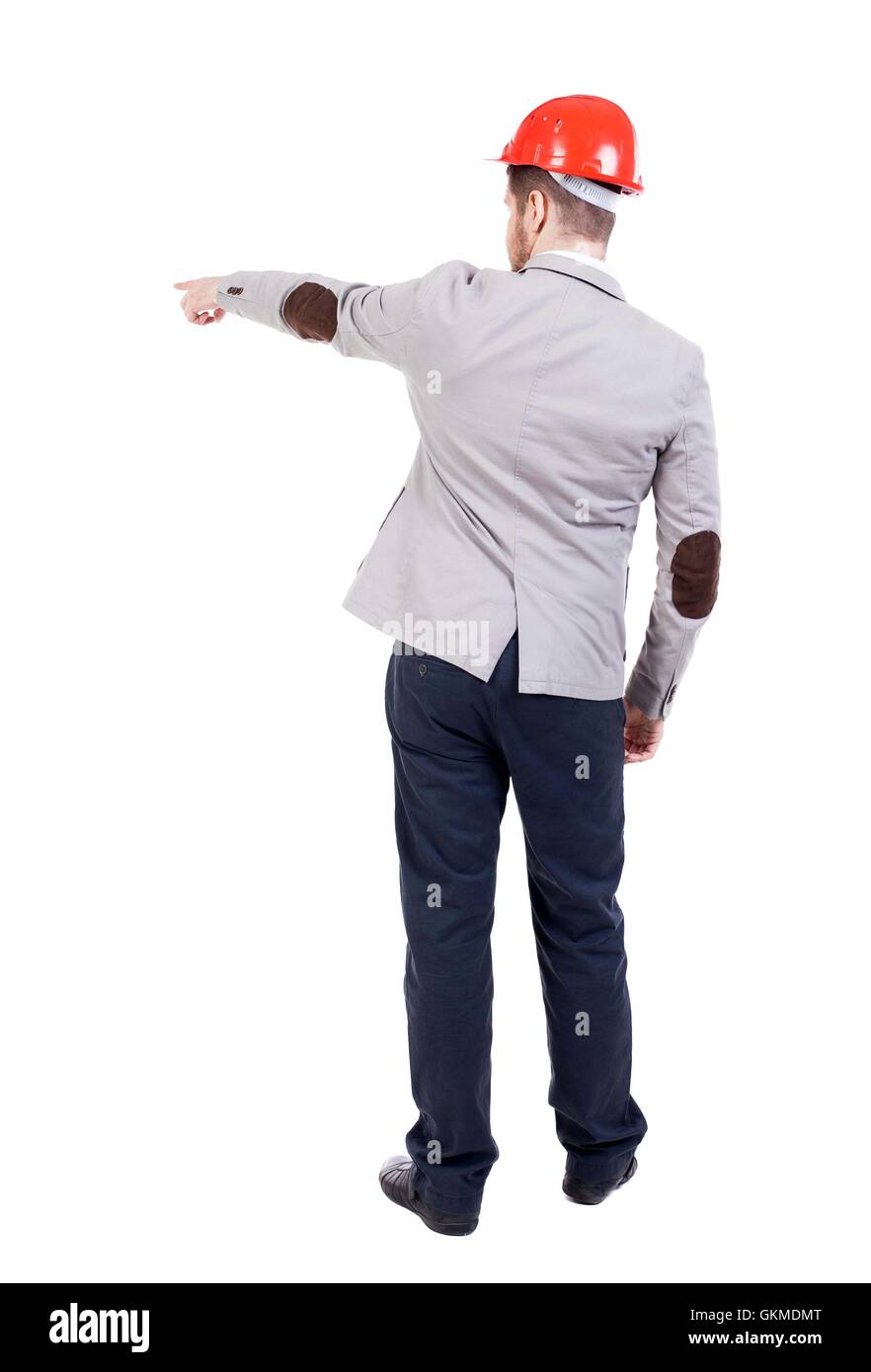 Back view of pointing young men in helmet Stock Photo - Alamy