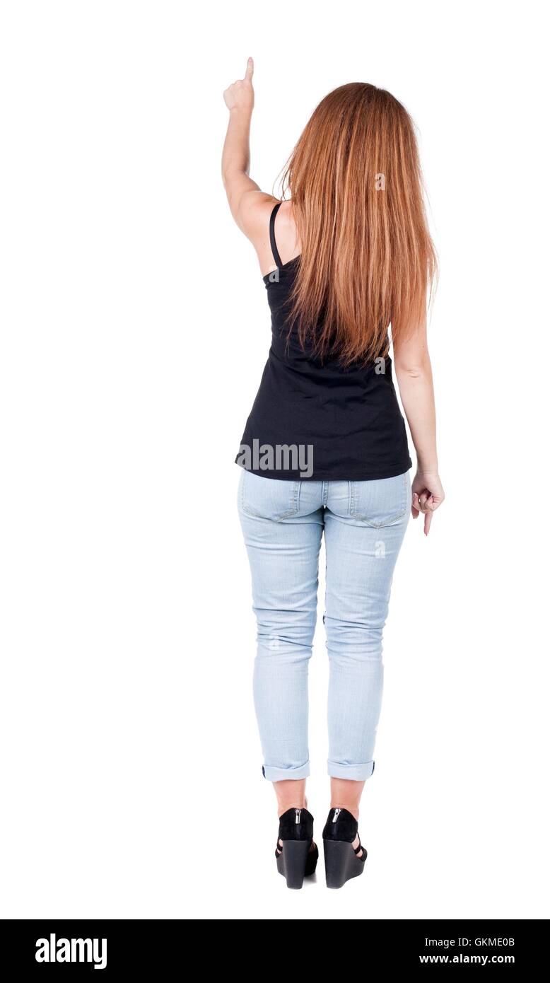 Back view of pointing woman Stock Photo - Alamy
