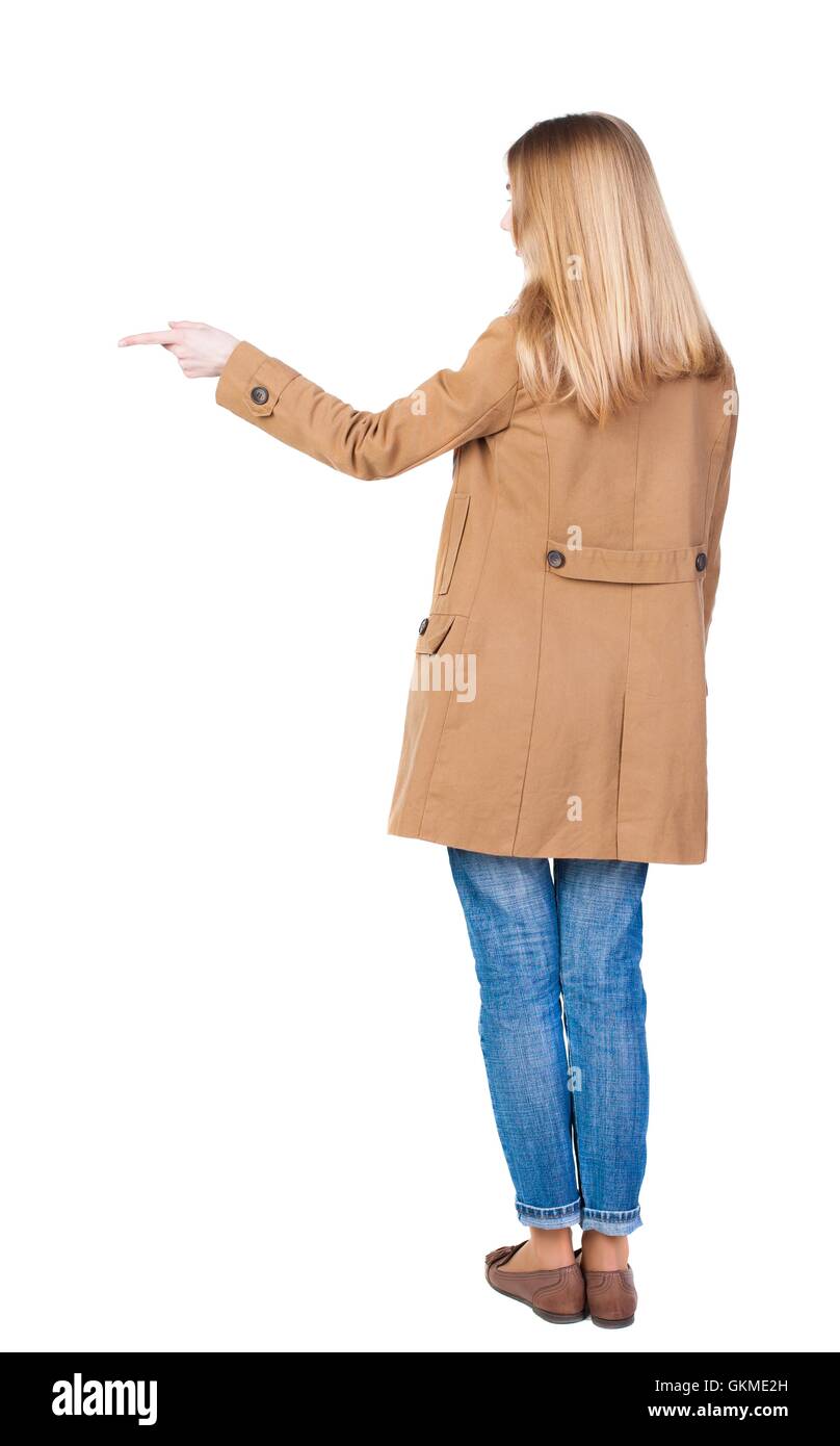 Back view of pointing woman Stock Photo - Alamy