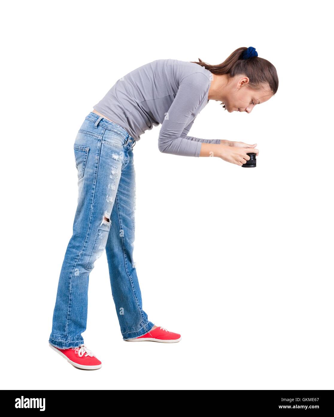 Back view of woman photographing Stock Photo - Alamy