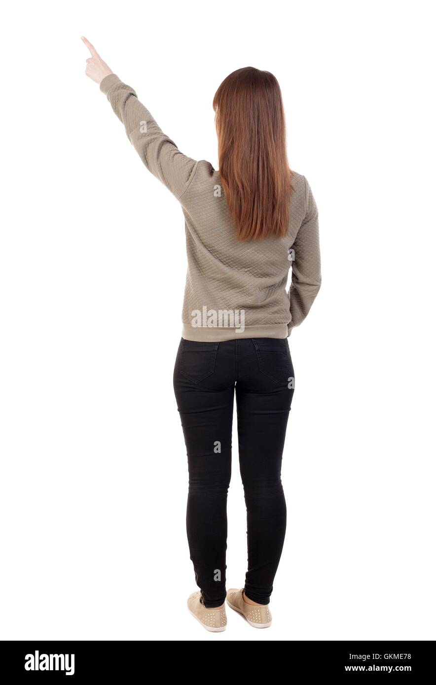 Back view of pointing woman Stock Photo - Alamy