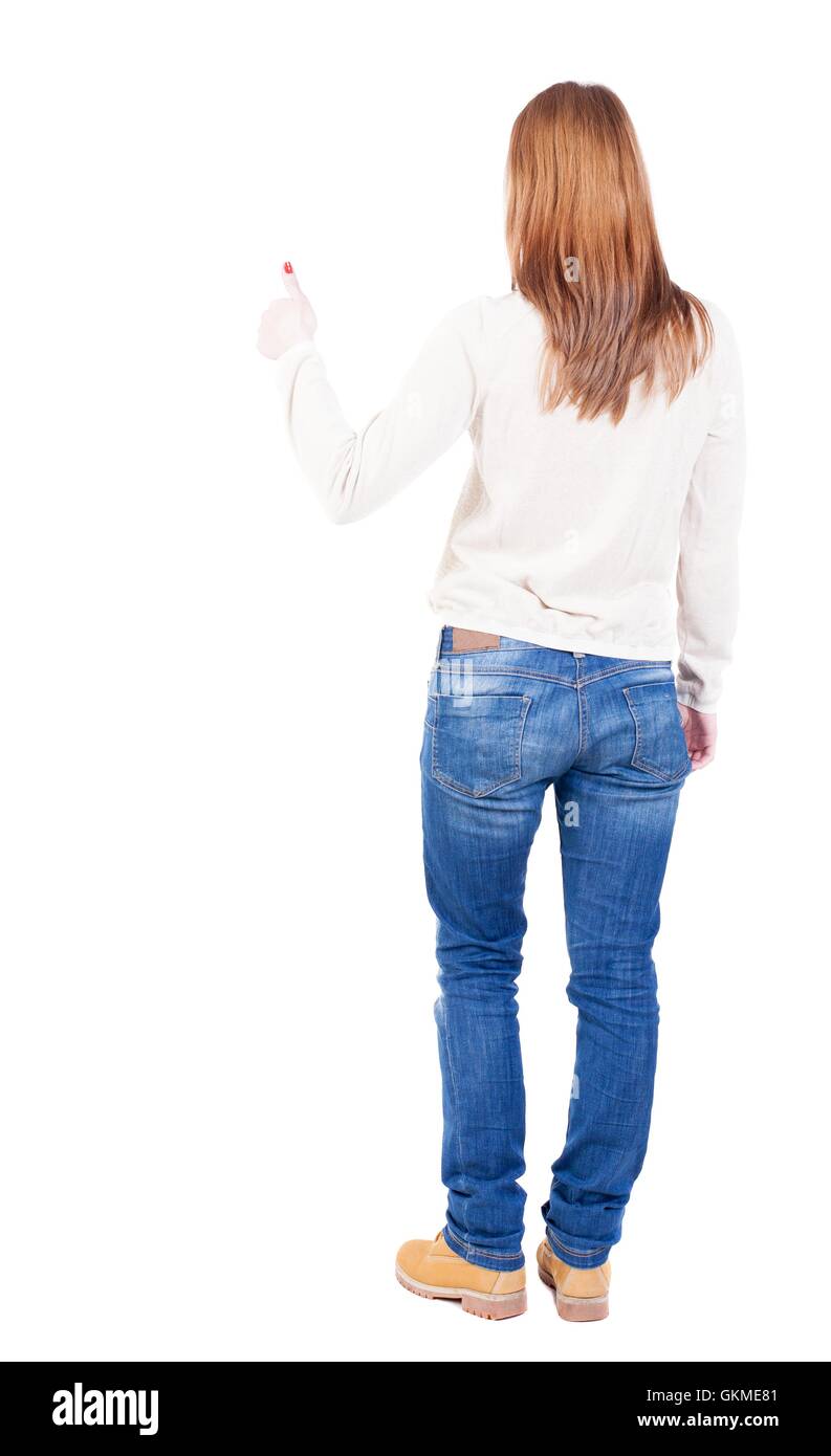 Back view of pointing woman Stock Photo - Alamy
