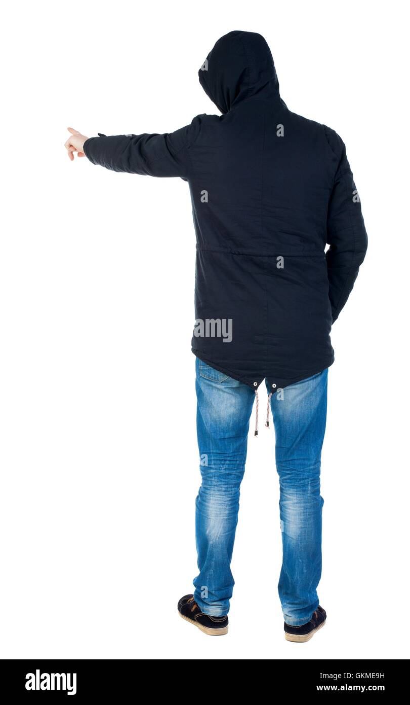 Back view of pointing young men in parka Stock Photo - Alamy