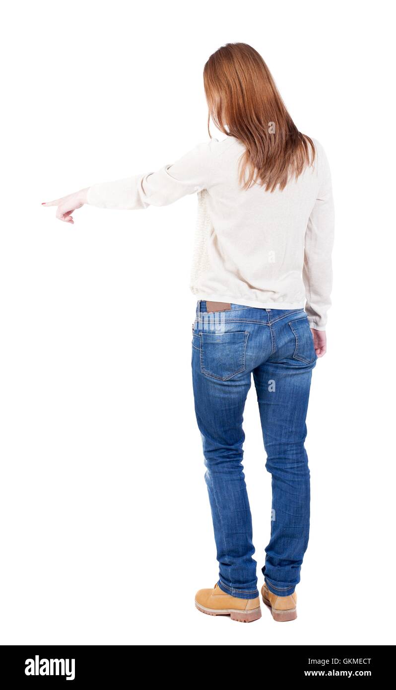 Back view of pointing woman Stock Photo - Alamy