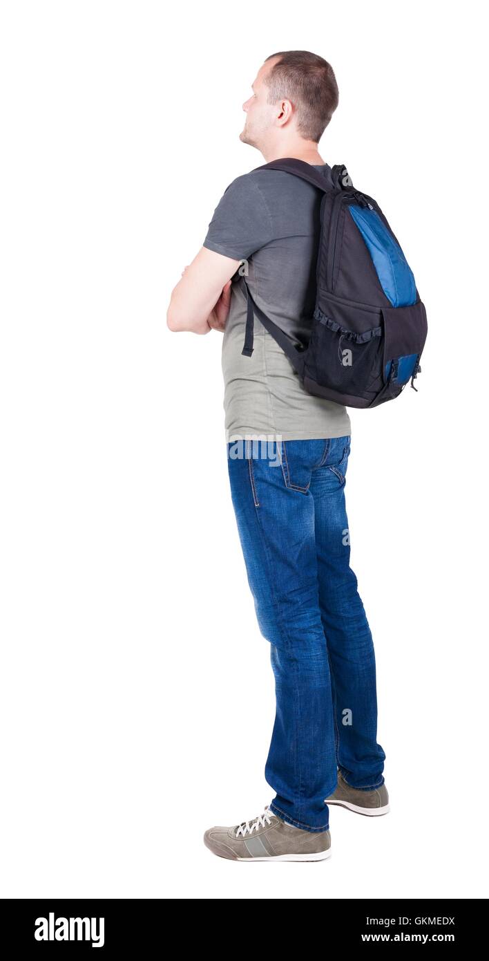 Back view of man with backpack looking up Stock Photo - Alamy