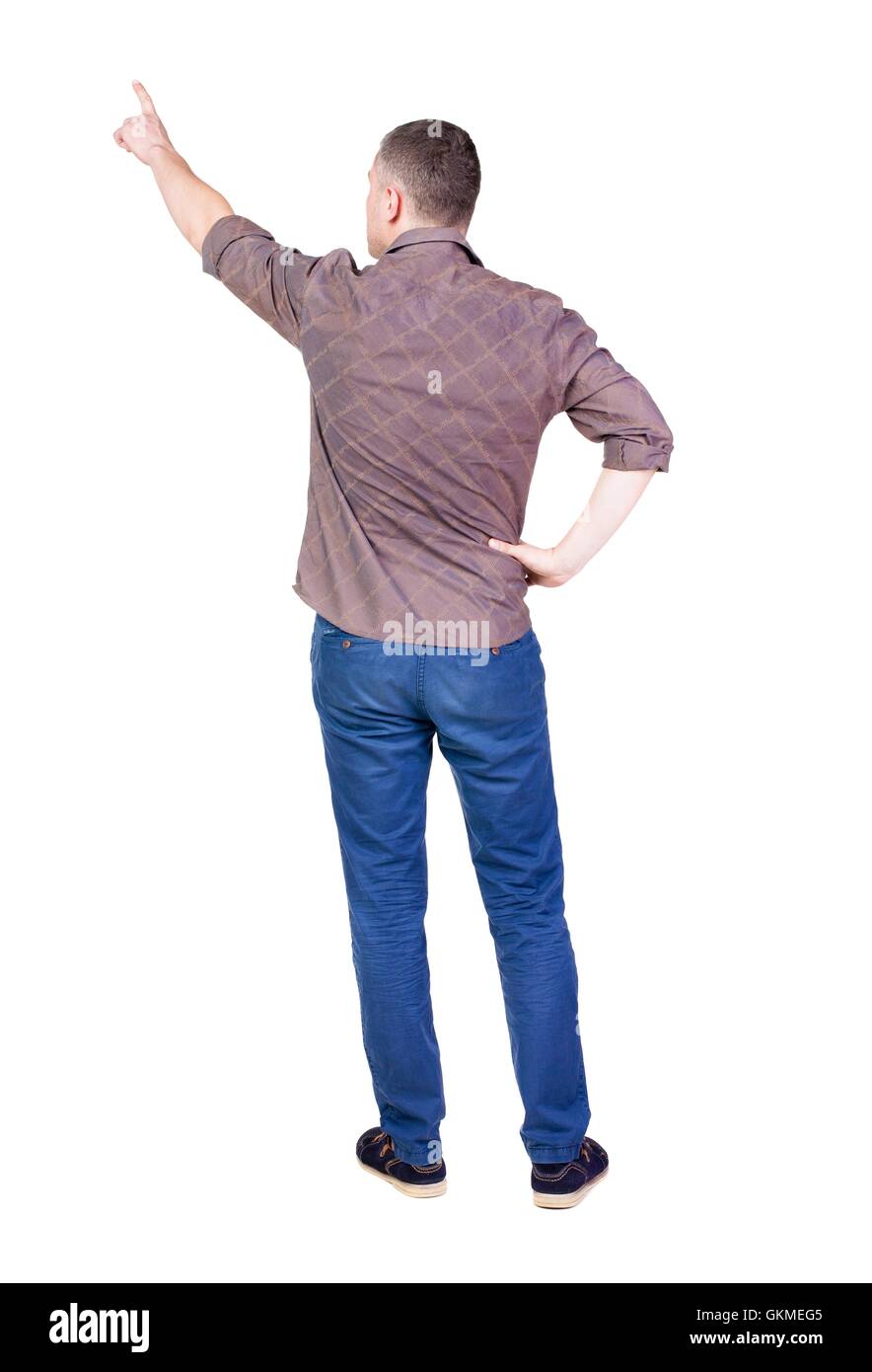 Back view of pointing young men in shirt and jeans Stock Photo - Alamy