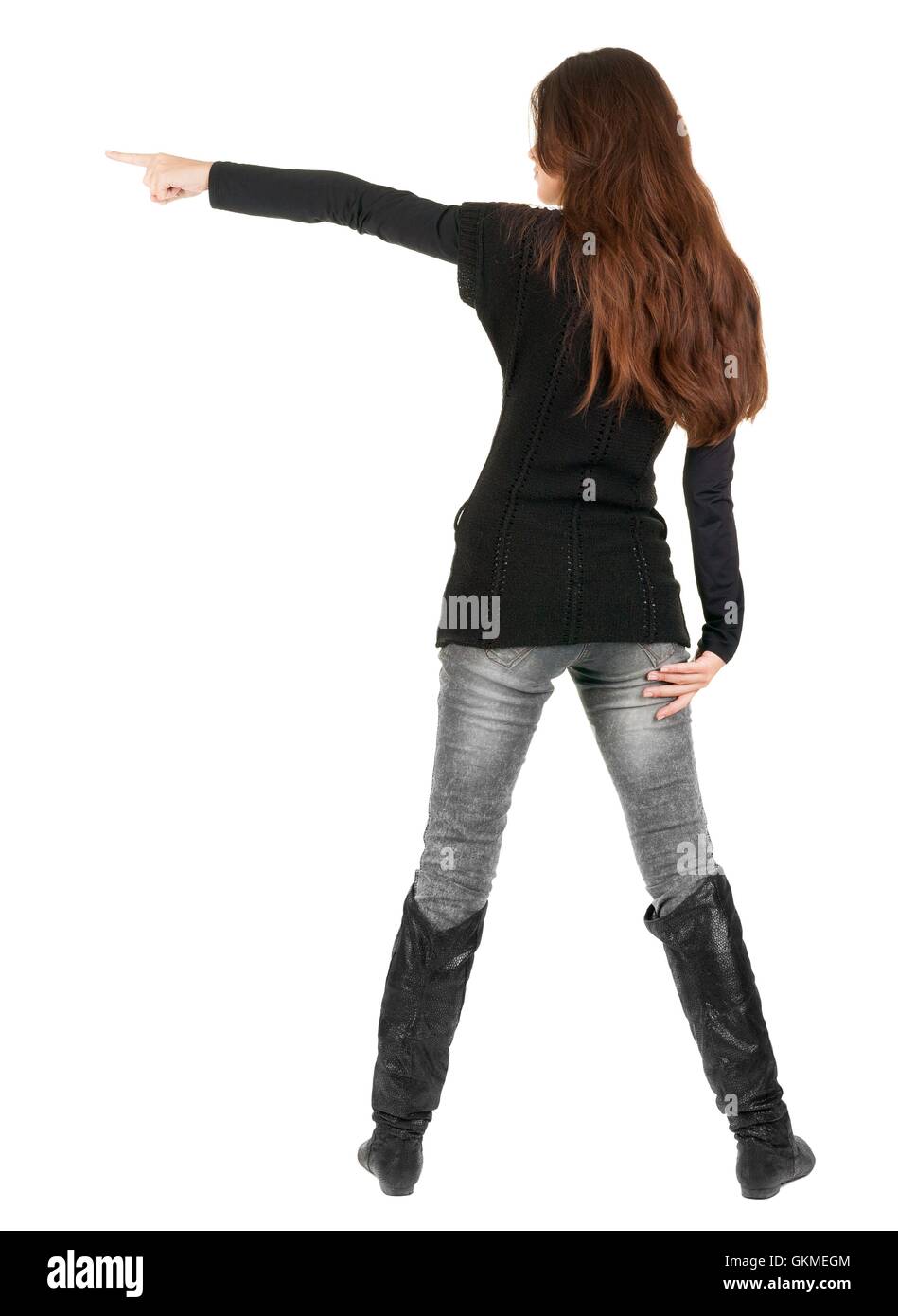 Back view of pointing woman Stock Photo - Alamy