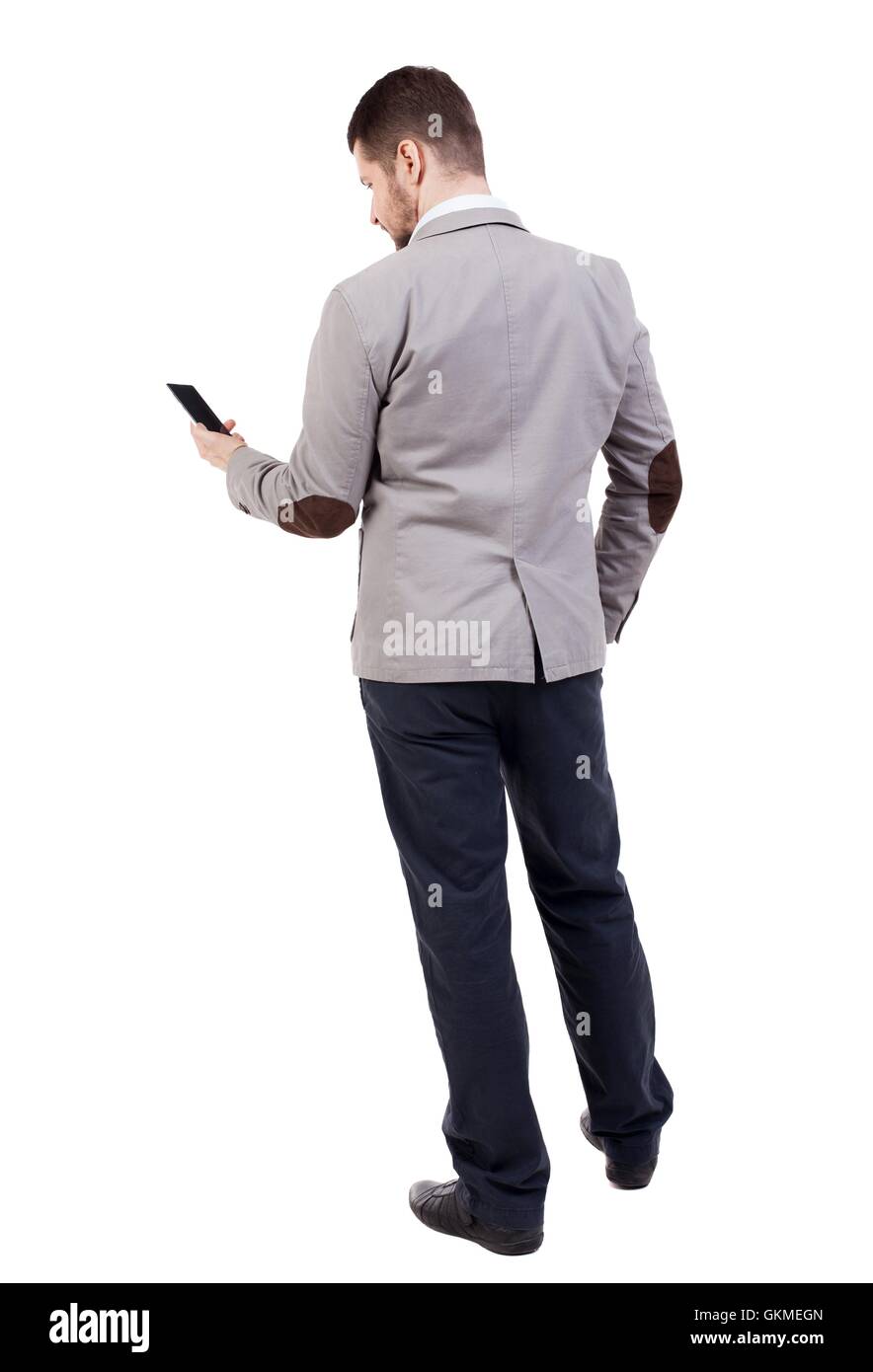 back view of business man in suit talking on mobile phone Stock Photo ...