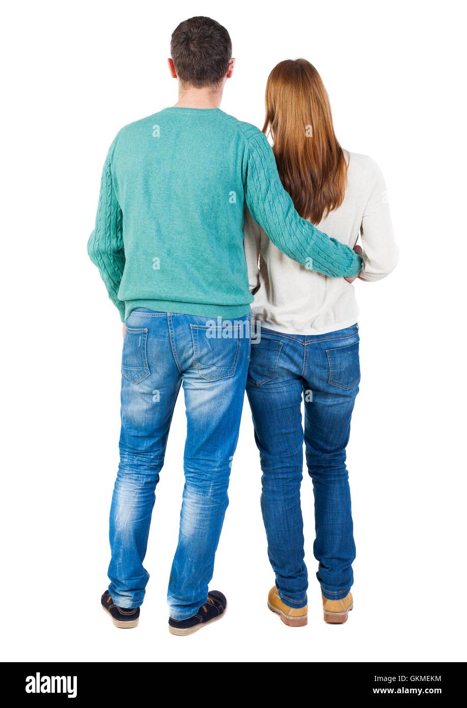 Back view of young embracing couple Stock Photo - Alamy